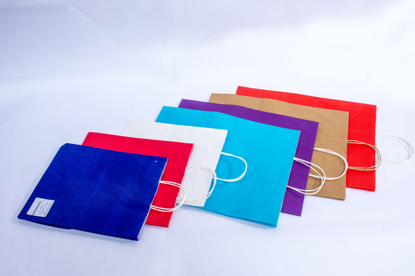 Paper Bags - Manufacturers of 3, 5 & 7 Layer Flexible Packaging Films